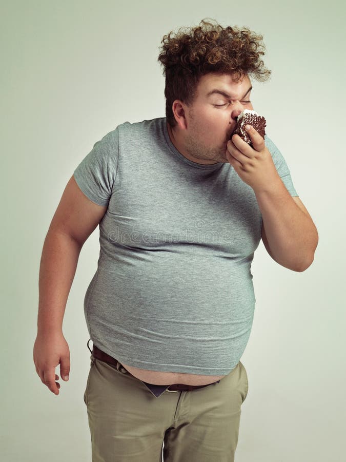 The Salad Dance. Studio Shot of an Overweight Man Holding a Bowl of ...