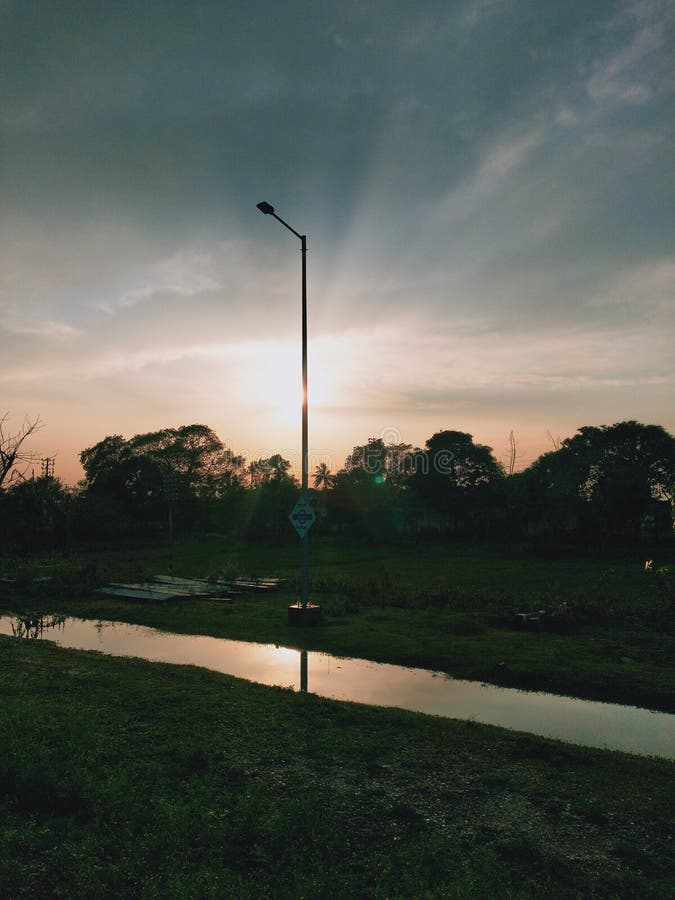 Good Evening, Sunlight, Cloud, Lamp Post, Water Stock Photo - Image of ...