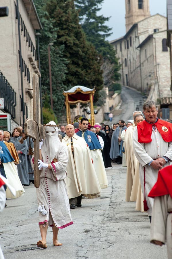 The Good Friday Procession in Assisi with the Penitent Cross-bearer and ...