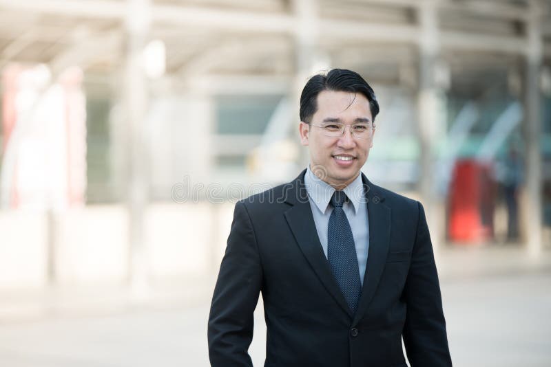 Good Looking Asian Business Man Standing with Formal Suit. Stock Photo ...