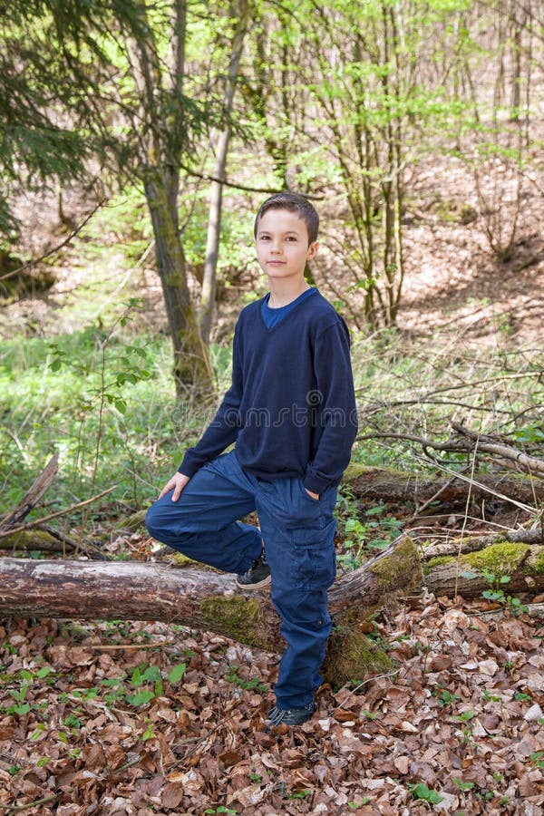 Good Looking Boy Standing in a Forest Stock Image - Image of portrait ...