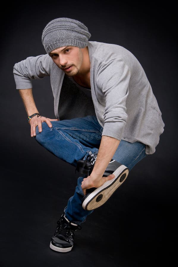 Good Looking Dancer Posing on a Dark Wall Stock Image - Image of model ...