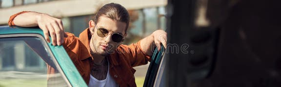 Good Looking Driver in Brown Stock Image - Image of captivating, city ...
