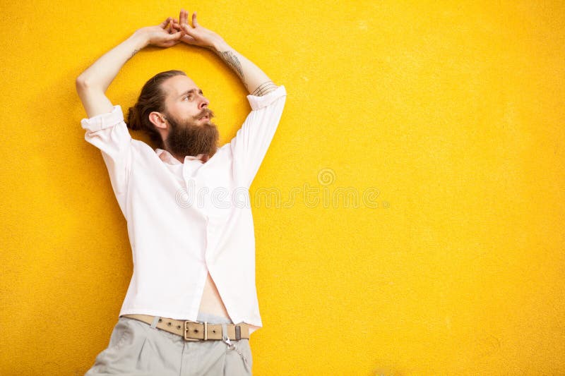 Good Looking Hipster Posing on Yellow Wall Stock Photo - Image of ...