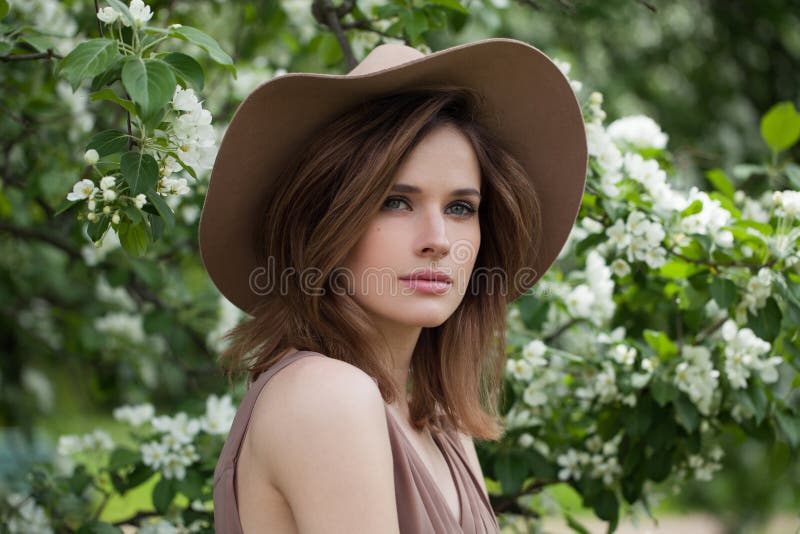 Good-looking Lady Female Model in Spring Leaves Background Stock Photo ...