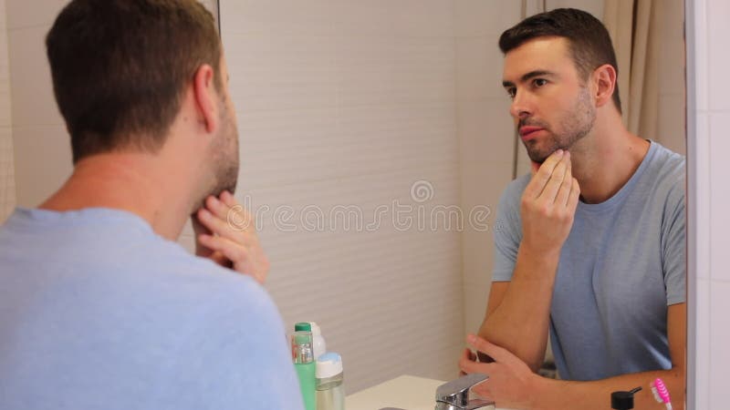 Good Looking Man Admiring His Natural Beauty Stock Footage - Video of ...