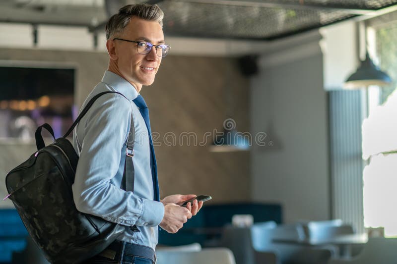 A Good-looking Man Choosing a Place in the Cafe Stock Photo - Image of ...
