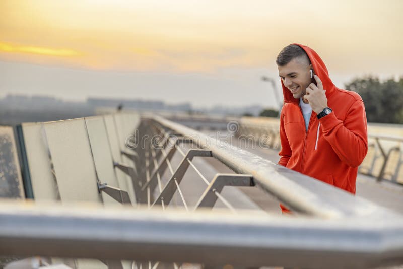 Good-looking Man Looking Down from a Bridge Stock Image - Image of ...