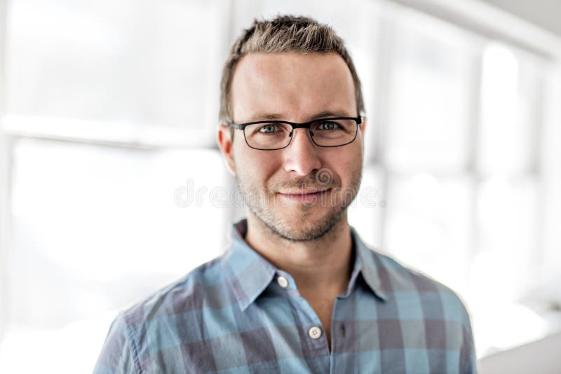 A Good Looking Man in Glasses, Portrait at Home Stock Photo - Image of ...