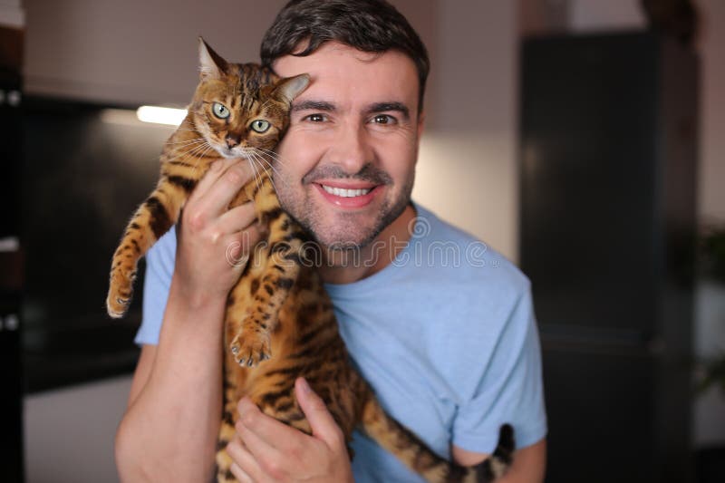 Good Looking Man and His Exotic Bengal Cat Stock Photo - Image of ...