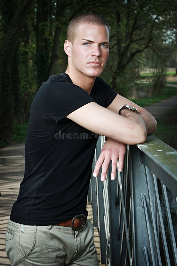 Good looking man outdoor stock image. Image of grasslands - 30681113