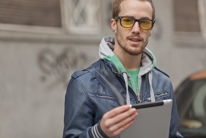 Good Looking Man on Street with Tablet Computer Stock Photo - Image of ...