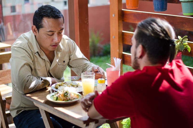 Good Looking Men Having Lunch in an Outdoor Restaurant, Men Chatting ...