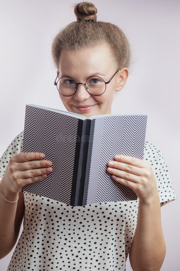 Good-looking Woman with Book Looking To Camera Stock Image - Image of ...