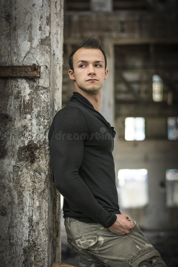Good Looking Young Man in Abandoned Warehouse Stock Image - Image of ...