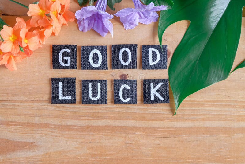 Good Luck Tag with Flower on Table Stock Photo - Image of symbols ...