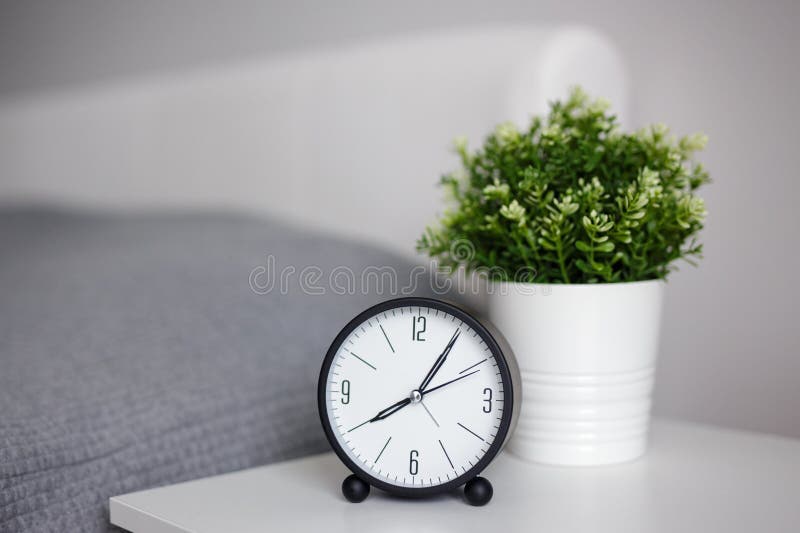 Good Morning Concept - Alarm Clock on Bedside Table Stock Image - Image ...