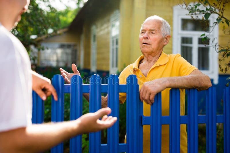 Good Neighbors Talk on Border of Their Farms Stock Photo - Image of ...