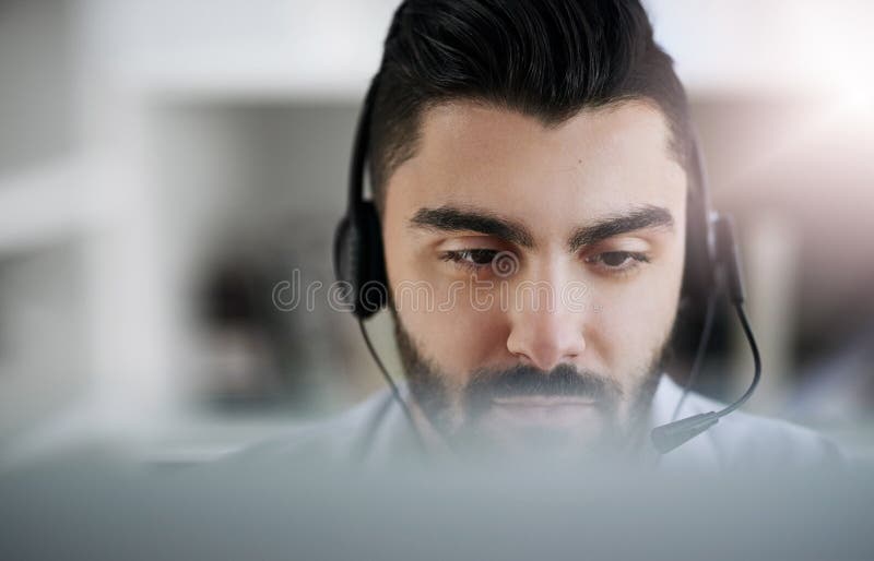 Good Service is Good Business. a Male Agent Working in a Call Centre ...