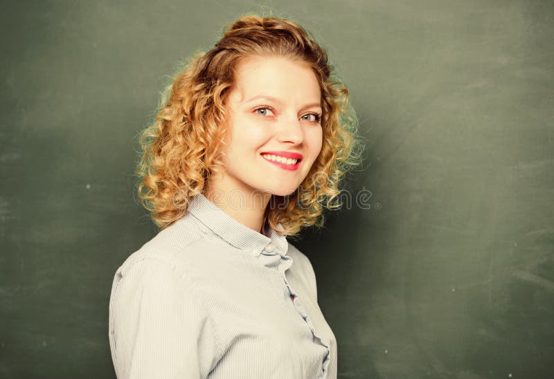 Good Teacher is Master of Simplification. Woman Teacher in Front of ...