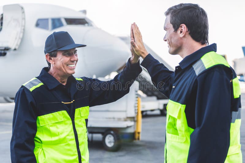 Happy Engineers Clapping Arms at Airdrome Stock Image - Image of ...