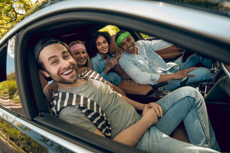 Happy Group of Friends in the Car Looking Excited Stock Image - Image ...