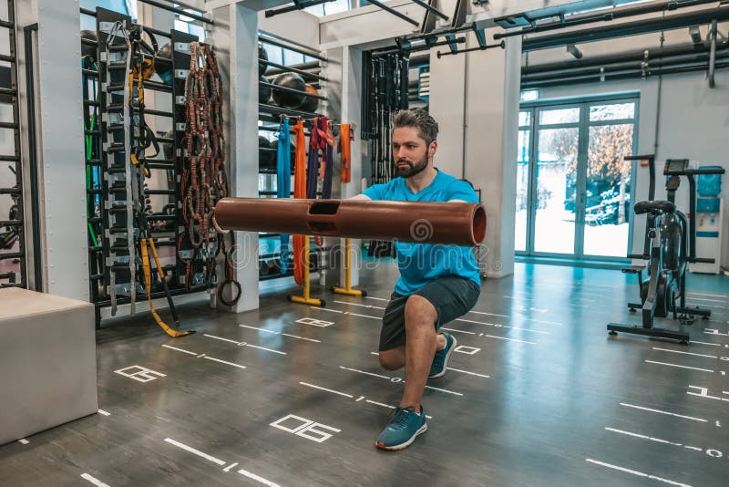 Athlete Exercising in the Gym and Looking Involved Stock Photo - Image ...