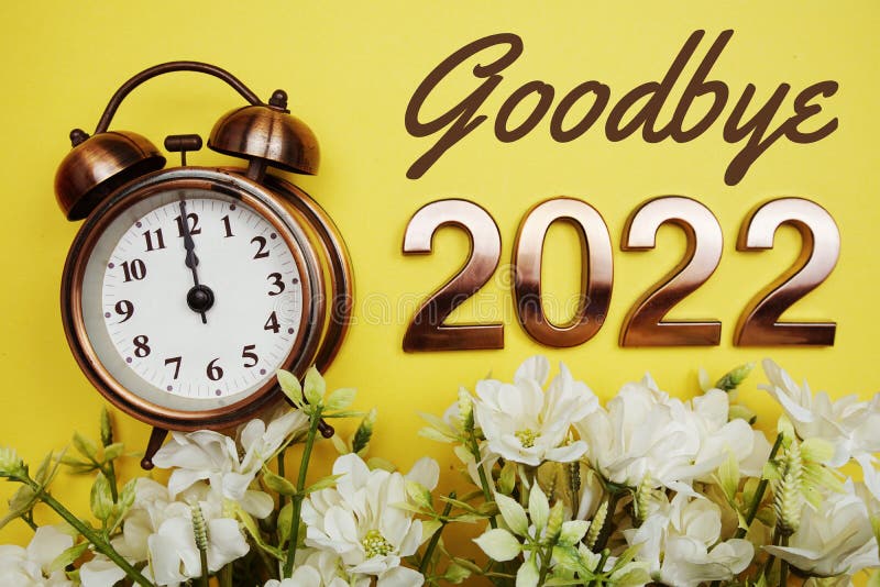 Goodbye 2022 Text with Alarm Clock and Flower Decoration on Yellow ...