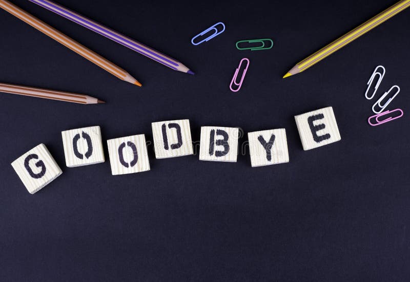 Goodbye. Text from Wooden Letters on a Black Office Desk. Stock Image ...