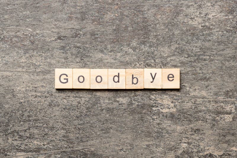 Goodbye Word Written on Wood Block. Goodbye Text on Table, Concept ...