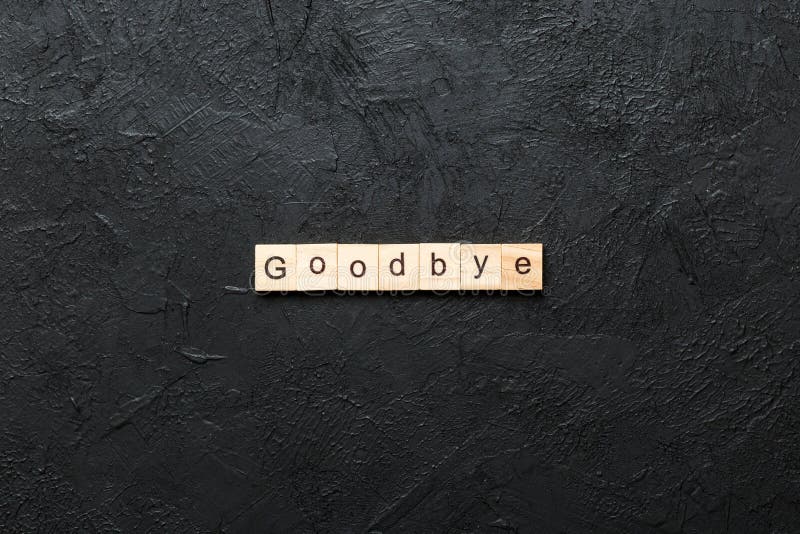 Goodbye Word Written on Wood Block. Goodbye Text on Table, Concept ...