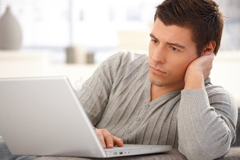 Goodlooking Man Focusing on Laptop Stock Image - Image of european ...