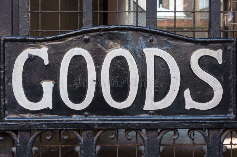 Goods Sign Close Up on a Metal Gate Stock Photo - Image of trademark ...