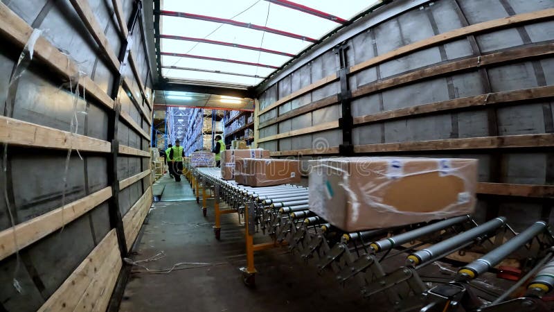 Goods are Unloaded from the Truck. the Process of Unloading Goods from ...