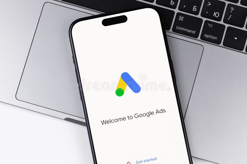 Google Ads Logo Mobile App on a Screen Smartphone IPhone with MacBook ...