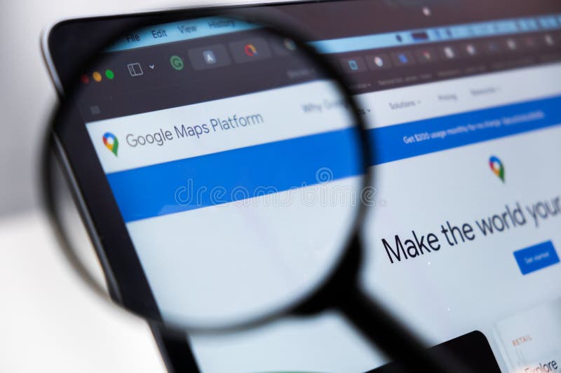 Google Maps Platform Logo Enlarged through a Magnifying Glass on a ...