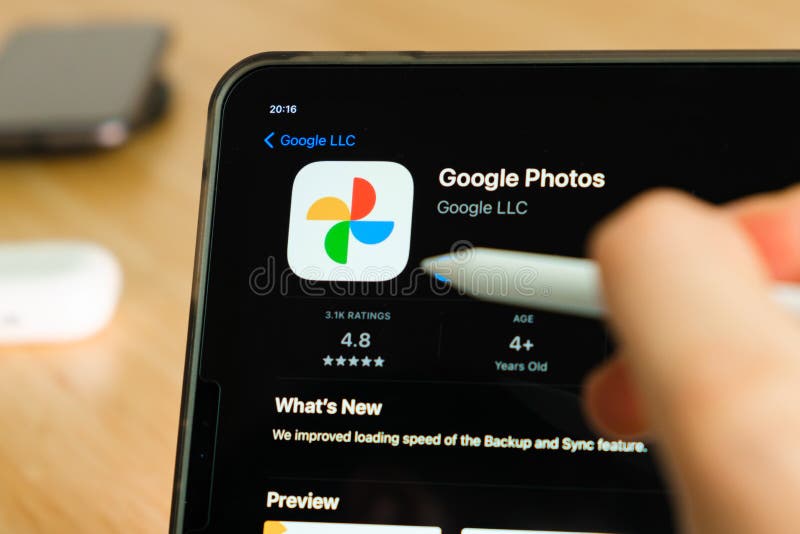 Google Photos Logo Shown by Apple Pencil on the IPad Pro Tablet Screen ...