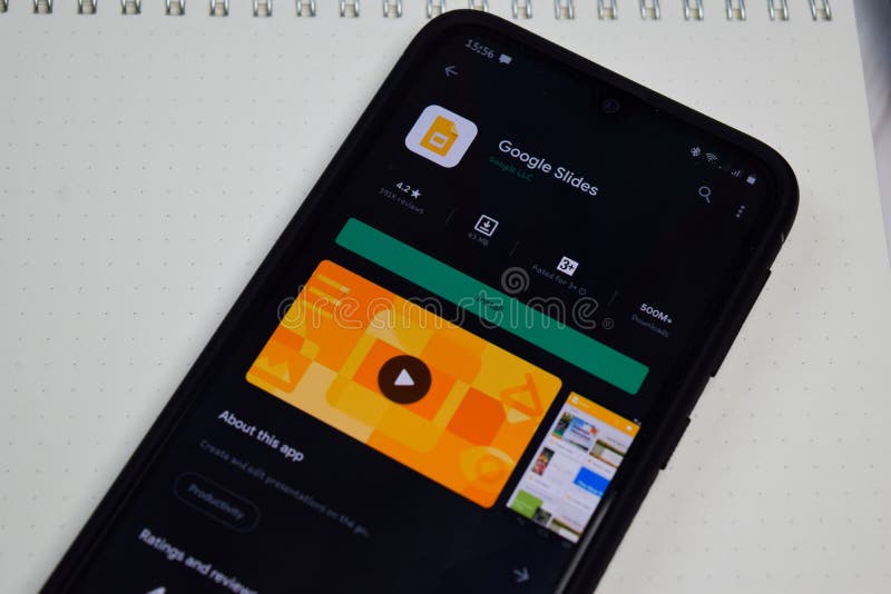 Google Slides Dev App with Magnifying on Smartphone Screen. Google ...