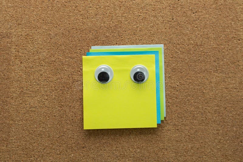Googly Eyes on Clean Multiple Sticky Note on Cork Board Concept Using ... Googly Eyes on Clean Multiple Sticky Note on Cork Board Concept Using ...