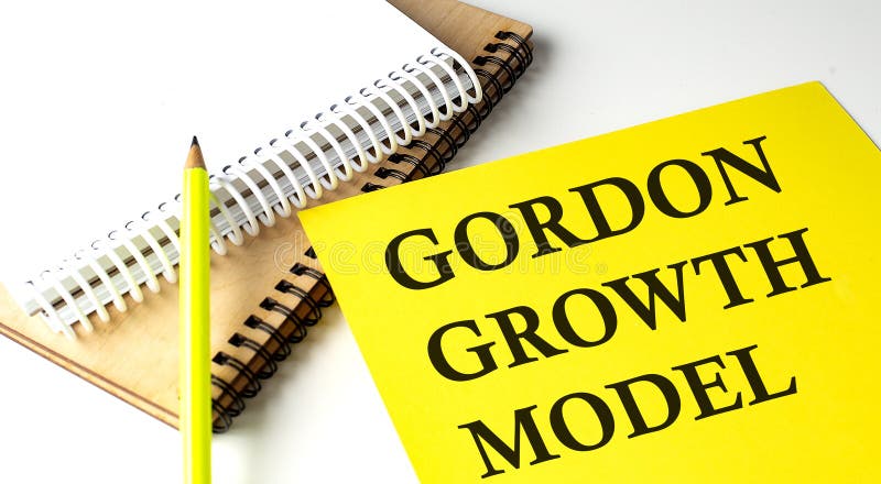 GORDON GROWTH MODEL Text on Yellow Paper with Notebooks Stock Image ...