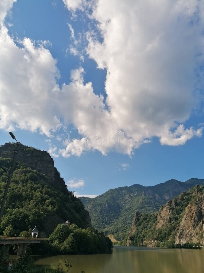 Olt river gorge, Caciulata stock photo. Image of clouds - 190056372