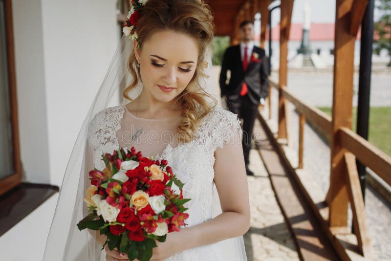 Gorgeous Emotional Blonde Bride Looking Handsome Young Groom Stock