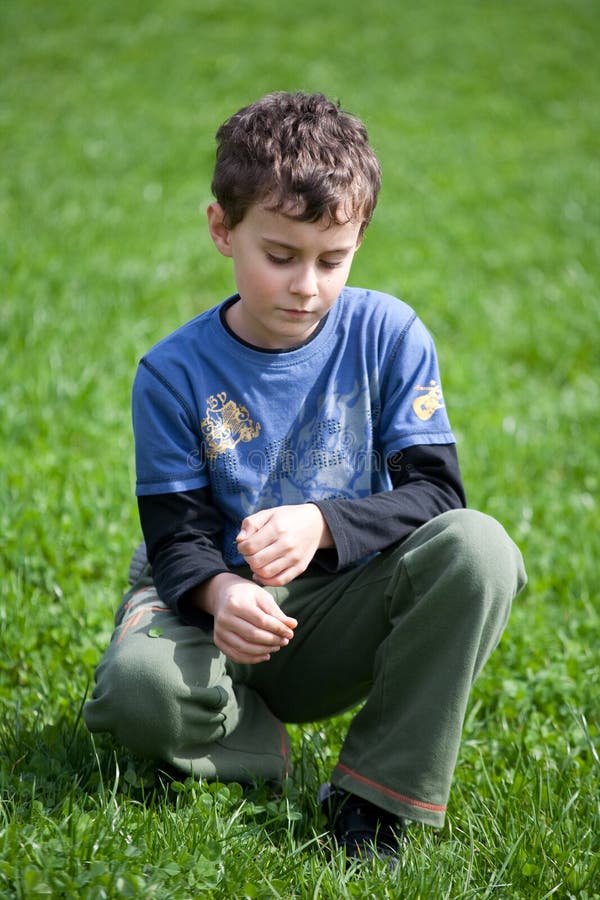 Gorgeous Boy in a Grass Field Stock Image - Image of peasant, holiday ...