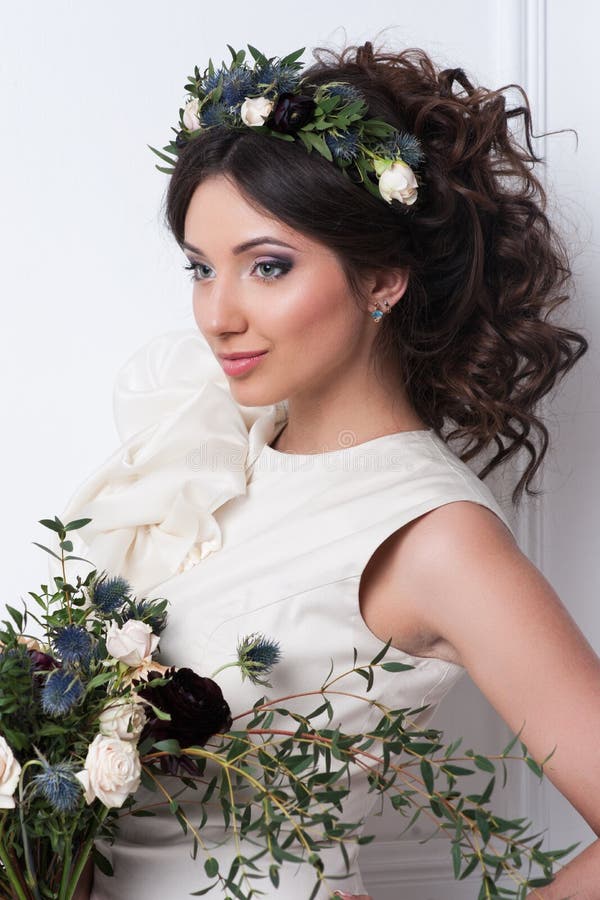 Gorgeous Bride with Flowers. Stock Image - Image of beautiful, bouquet ...