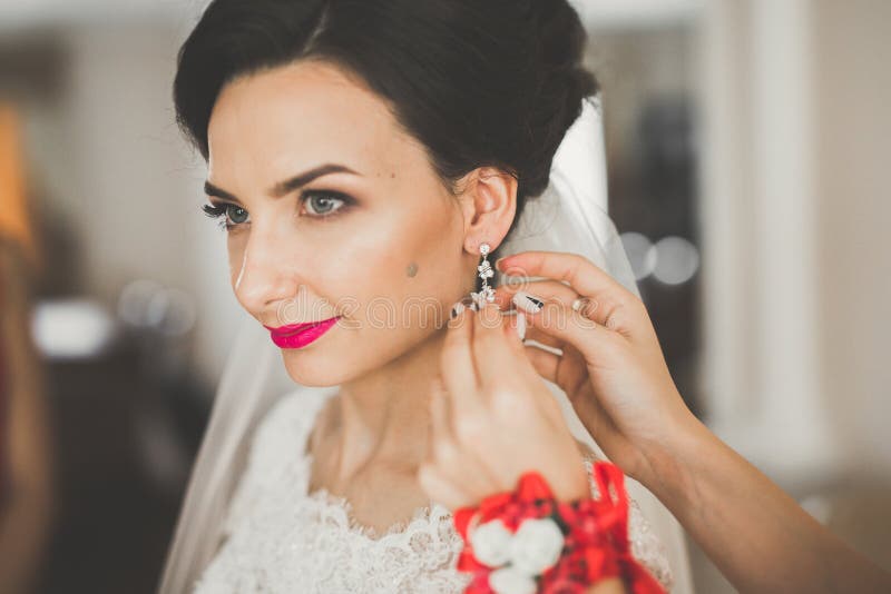 Gorgeous Bride in Robe Posing and Preparing for the Wedding Ceremony ...