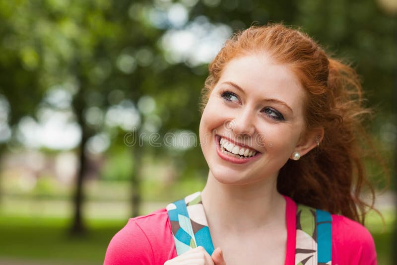 Gorgeous Cheerful Student Looking Up Stock Image - Image of long, lawn ...