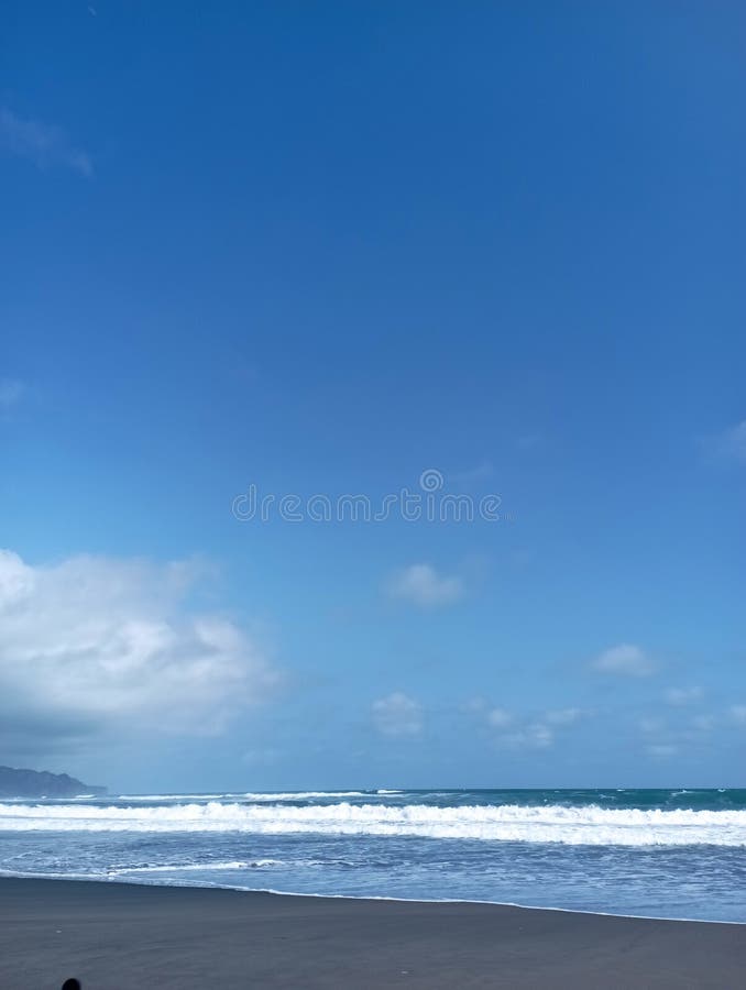 Gorgeous Clouds Floating Above the Beach& X27;s Azure Water Stock Photo ...
