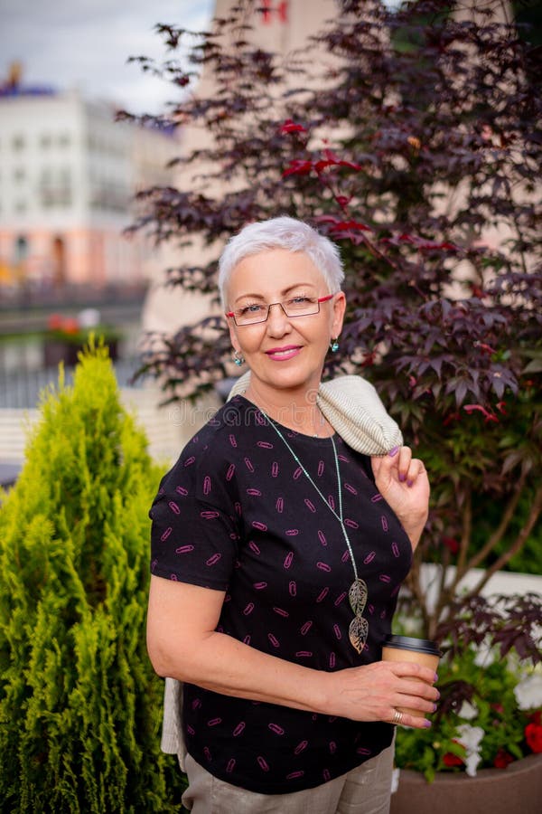 Gorgeous Elderly Lady is Standing in the Wonderful Park Stock Photo ...