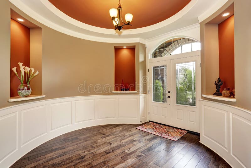 Gorgeous Entryway with Round Red Walls and Nice Decor Stock Photo ...