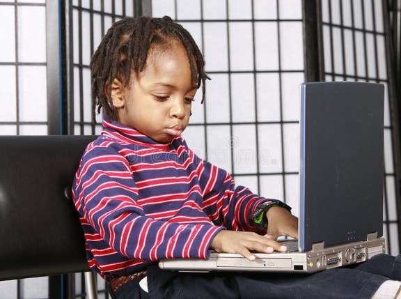 Gorgeous Kid with a Computer Stock Photo - Image of affection, play: 392356